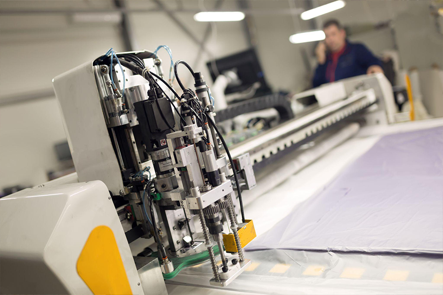 What Types of Machines Are Needed for a Garment Factory?